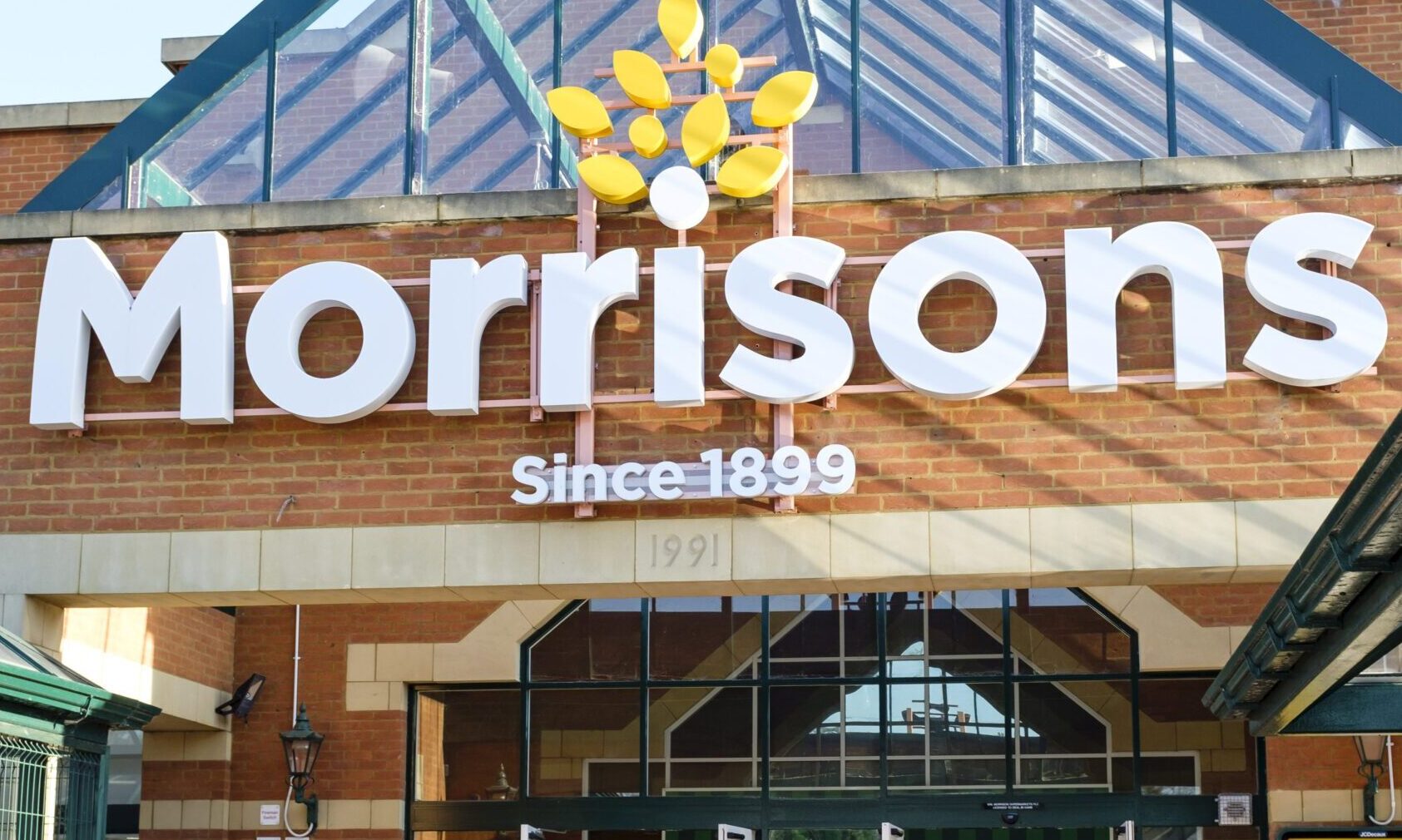 Morrisons to axe hundreds of roles as part of cost-cutting plans ...